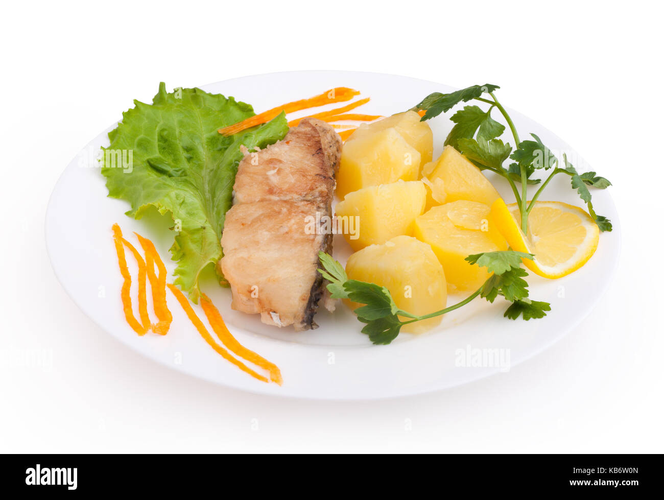fish and potatoes served isolated on white background Stock Photo - Alamy