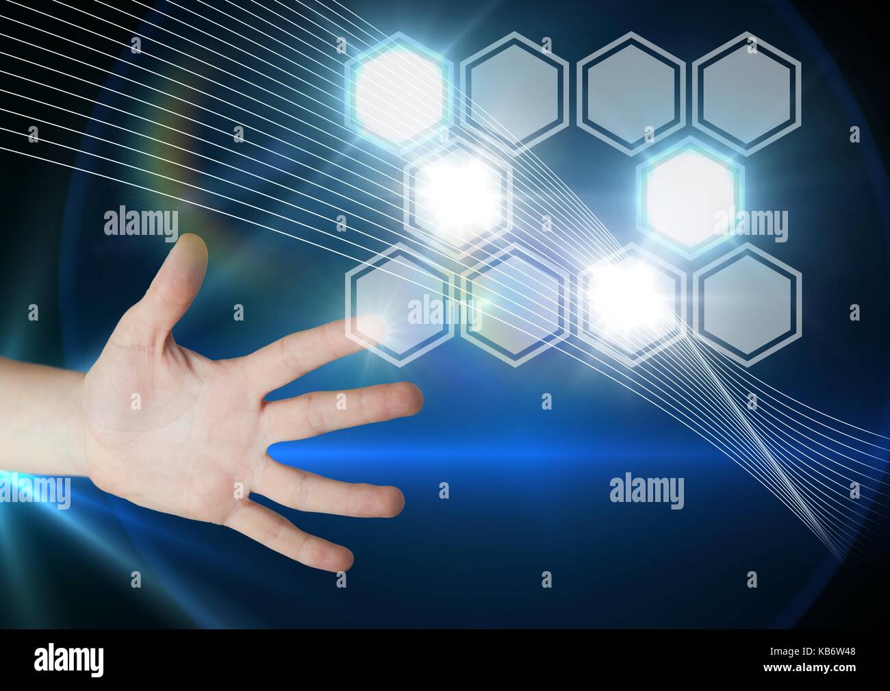 Digital composite of Hand touching icons interface of hexagons Stock ...
