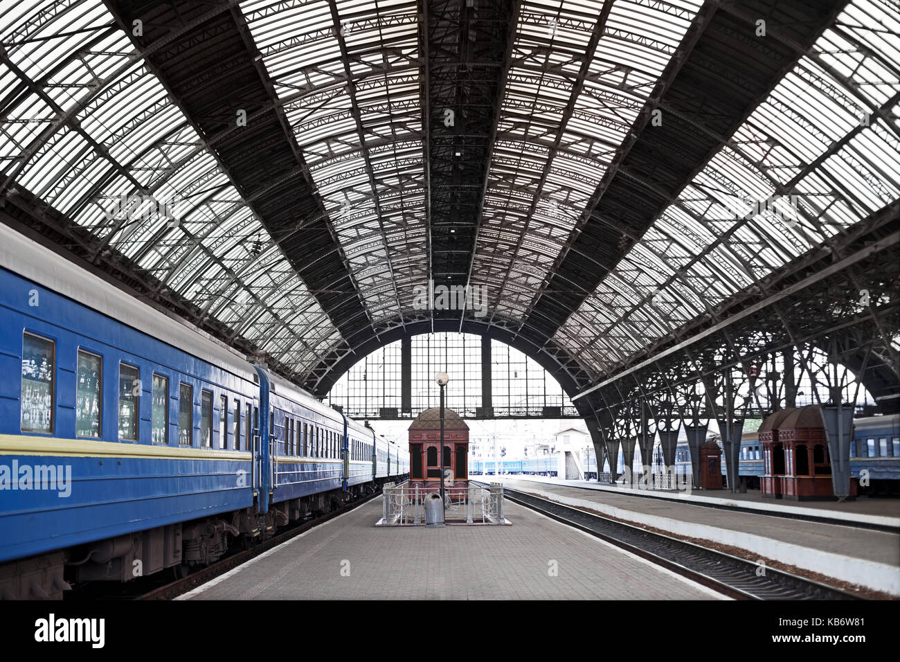 Covered old railway station with trains Stock Photo - Alamy