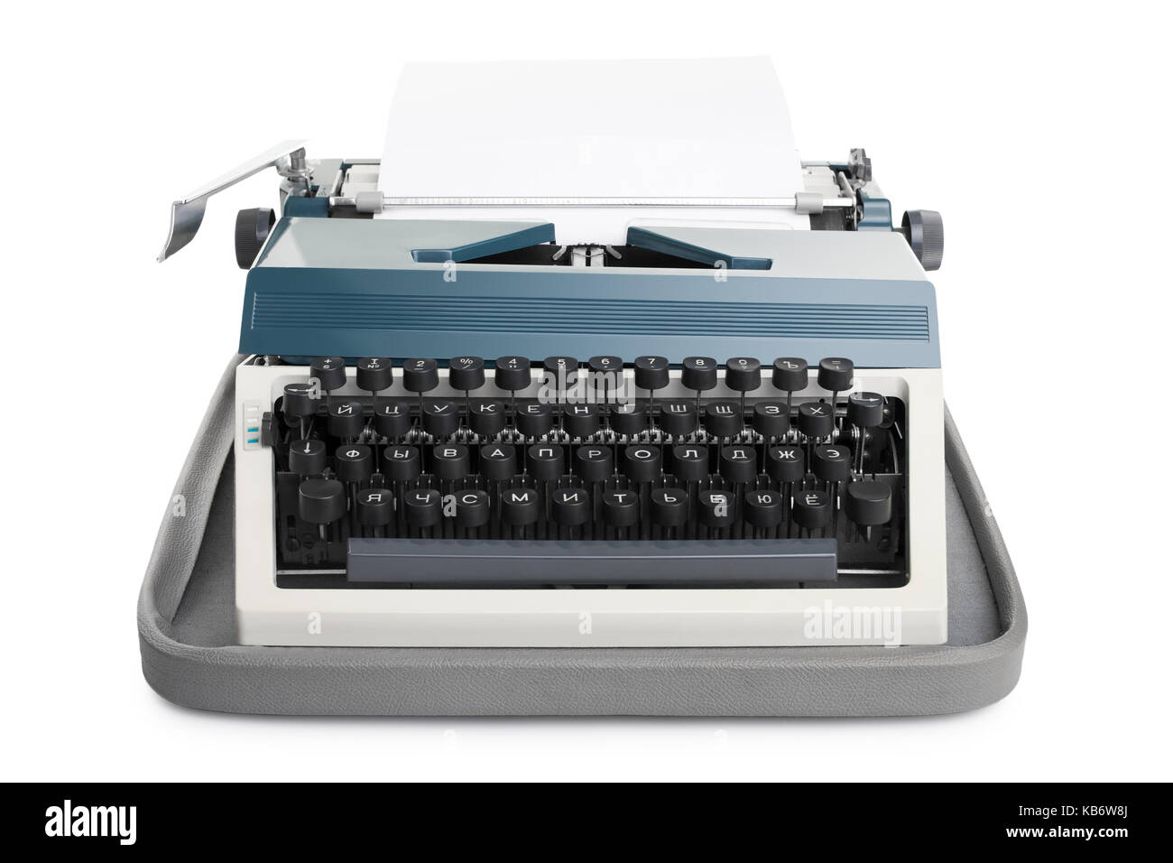 Typewriter with blank paper isolated on a white background Stock Photo ...