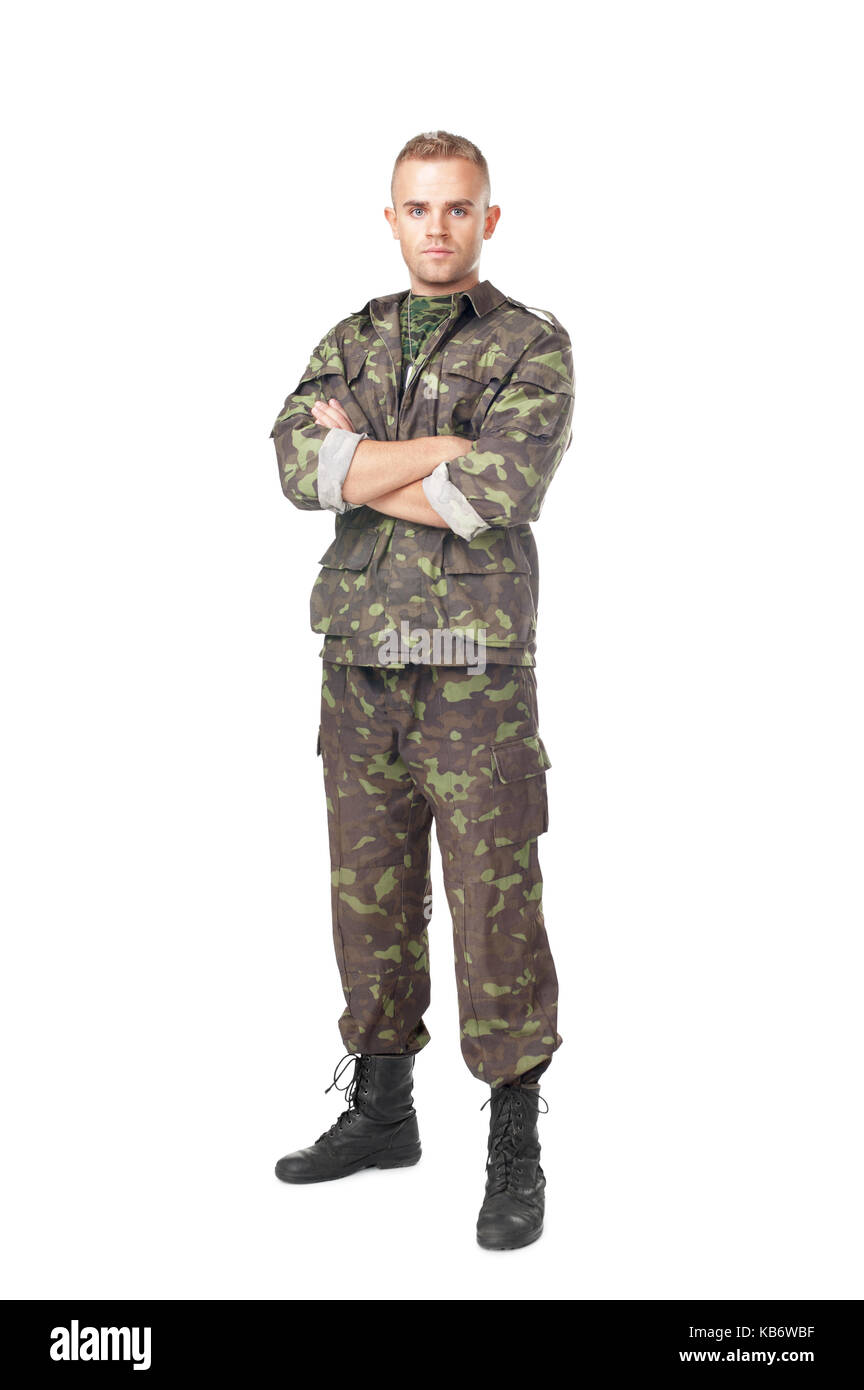 Full length portrait of serious army soldier with his arms crossed ...