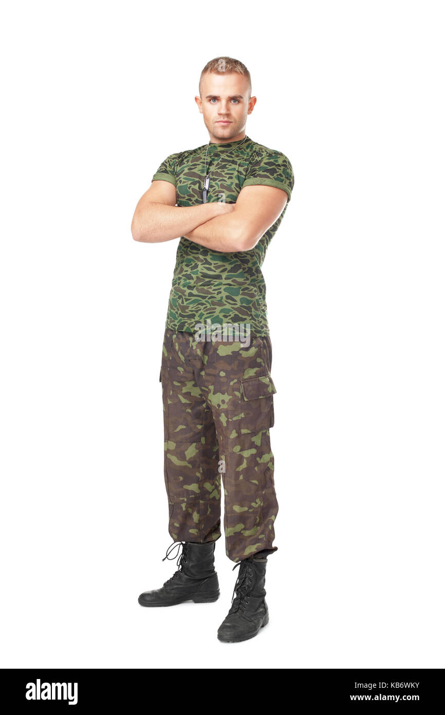 Full length portrait of serious army soldier with his arms crossed ...