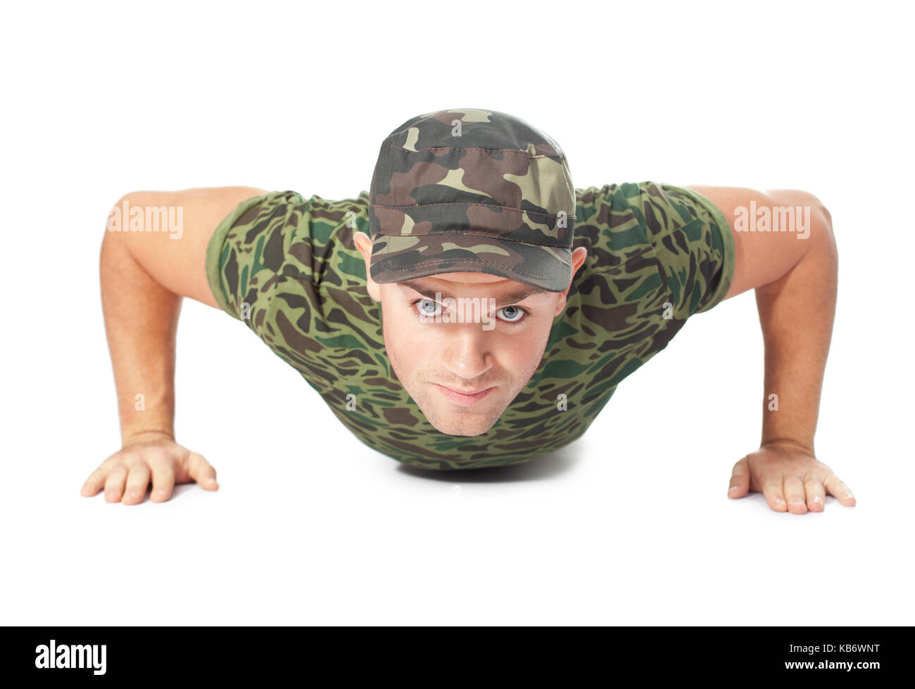 Young army soldier doing push up isolated on white background.Front ...