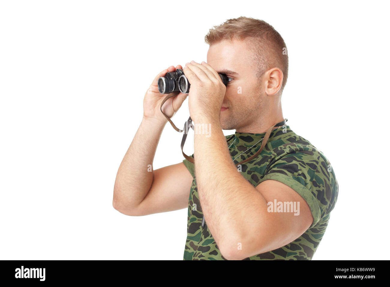 Young army soldier looking through binoculars isolated on white ...