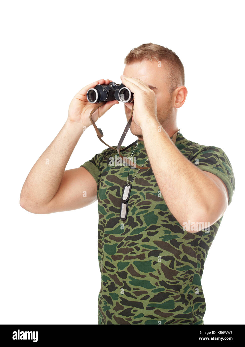 Young army soldier looking through binoculars isolated on white ...