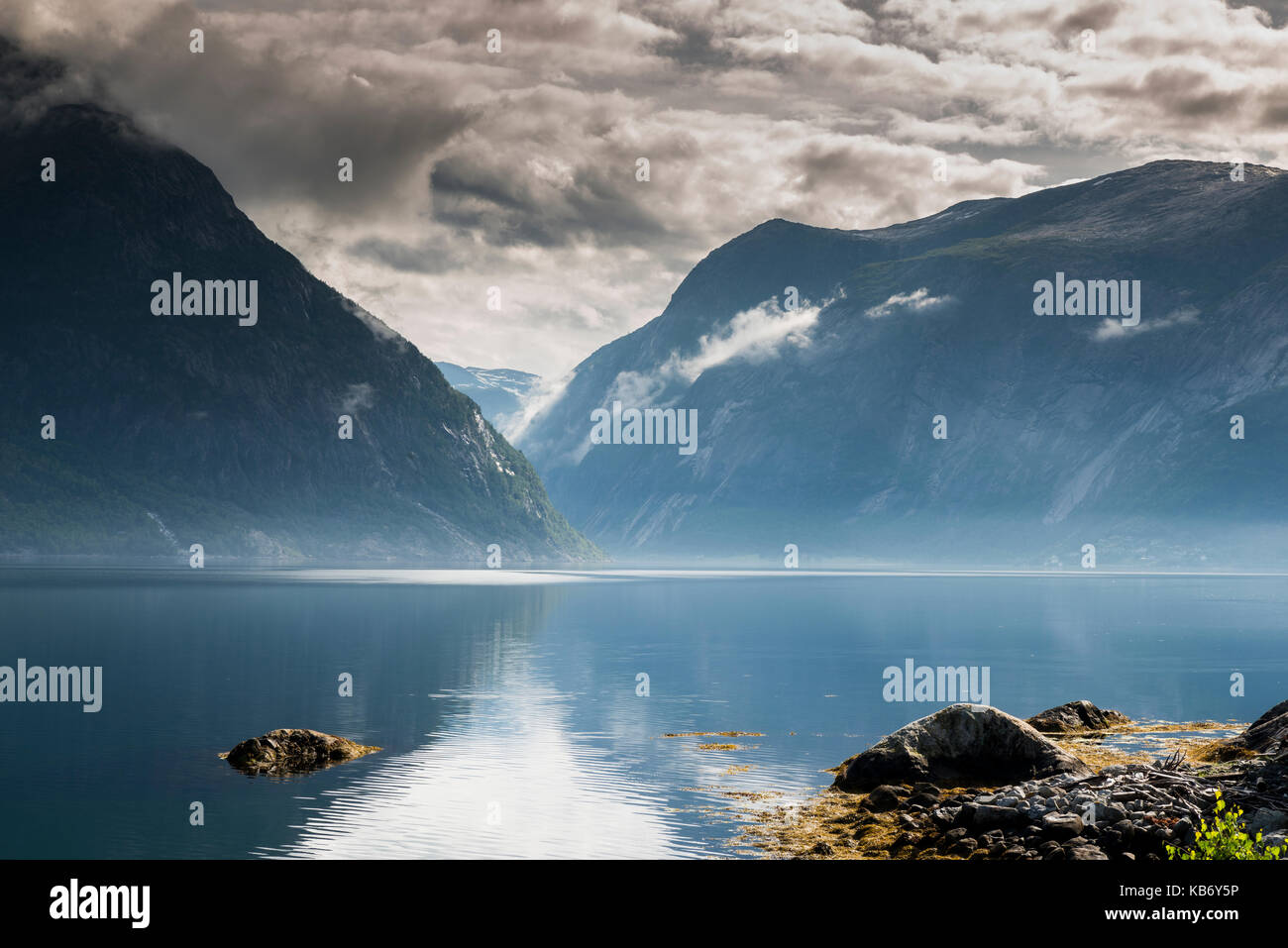 reflection of mountains and nature in eidfjord norway Stock Photo - Alamy