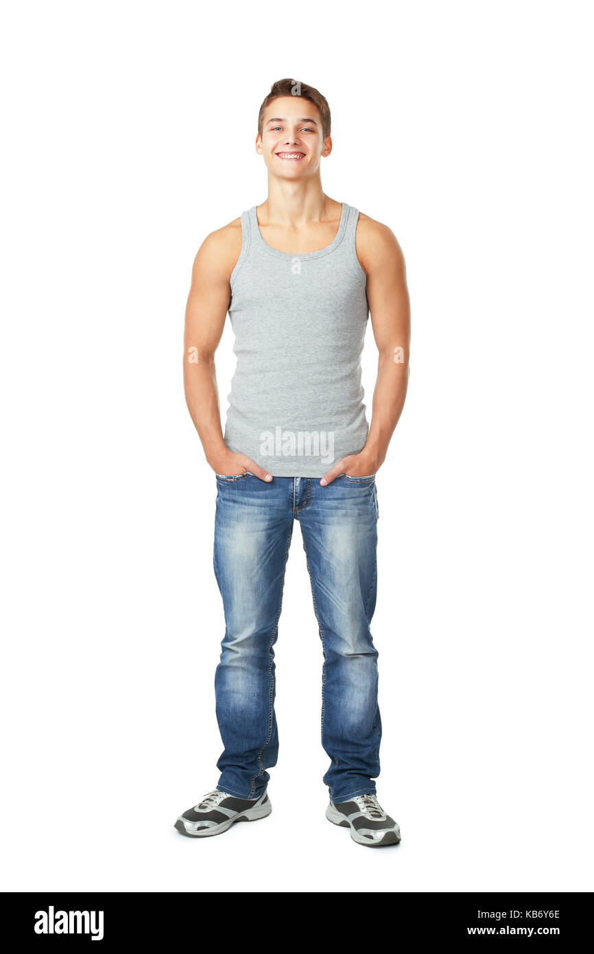Full length portrait of happy smiling young man standing with hands in ...