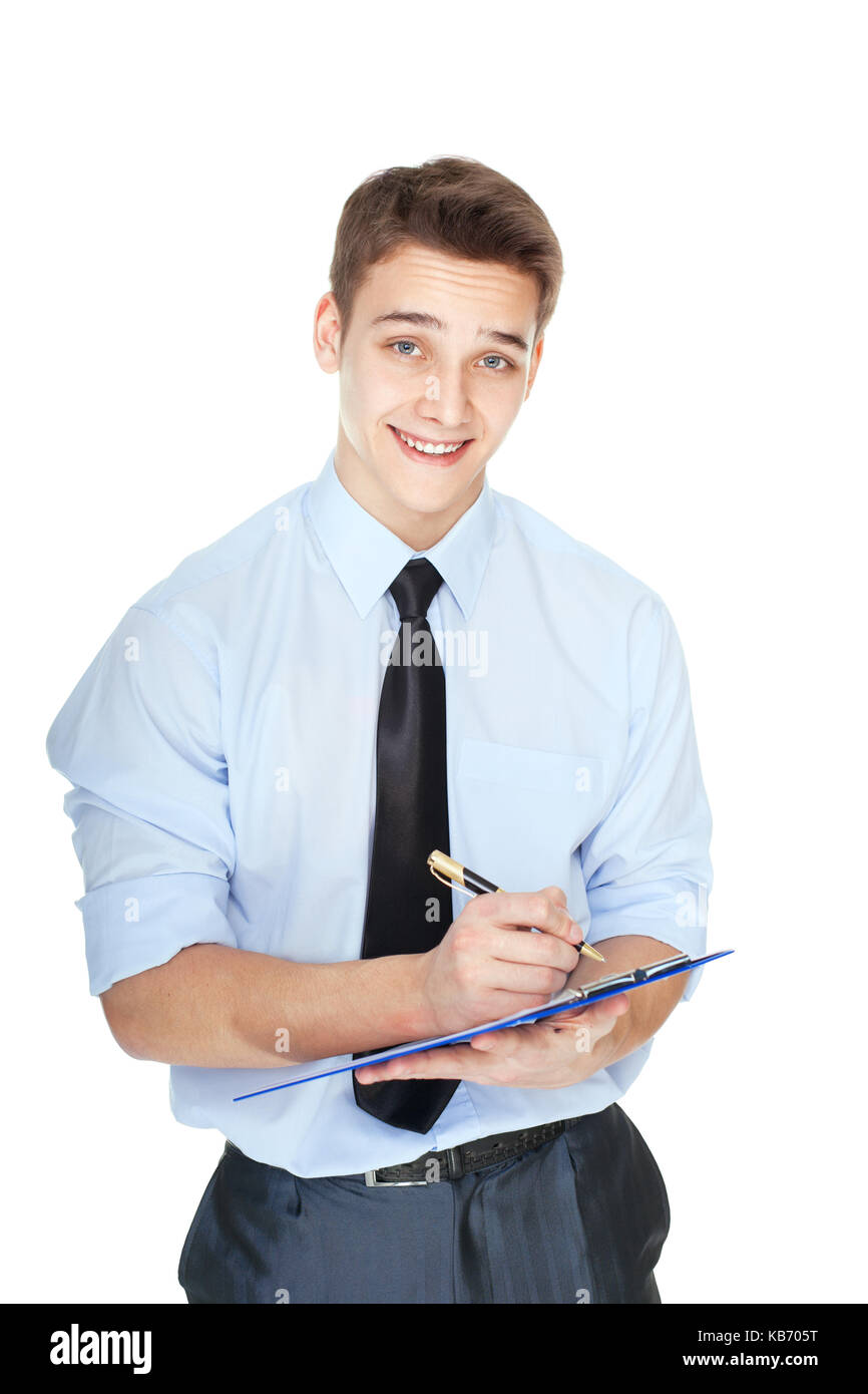 Portrait of young business man taking notes isolated on white ...
