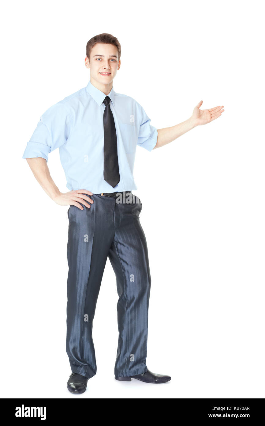 Full length portrait of young successful businessman showing a copy ...