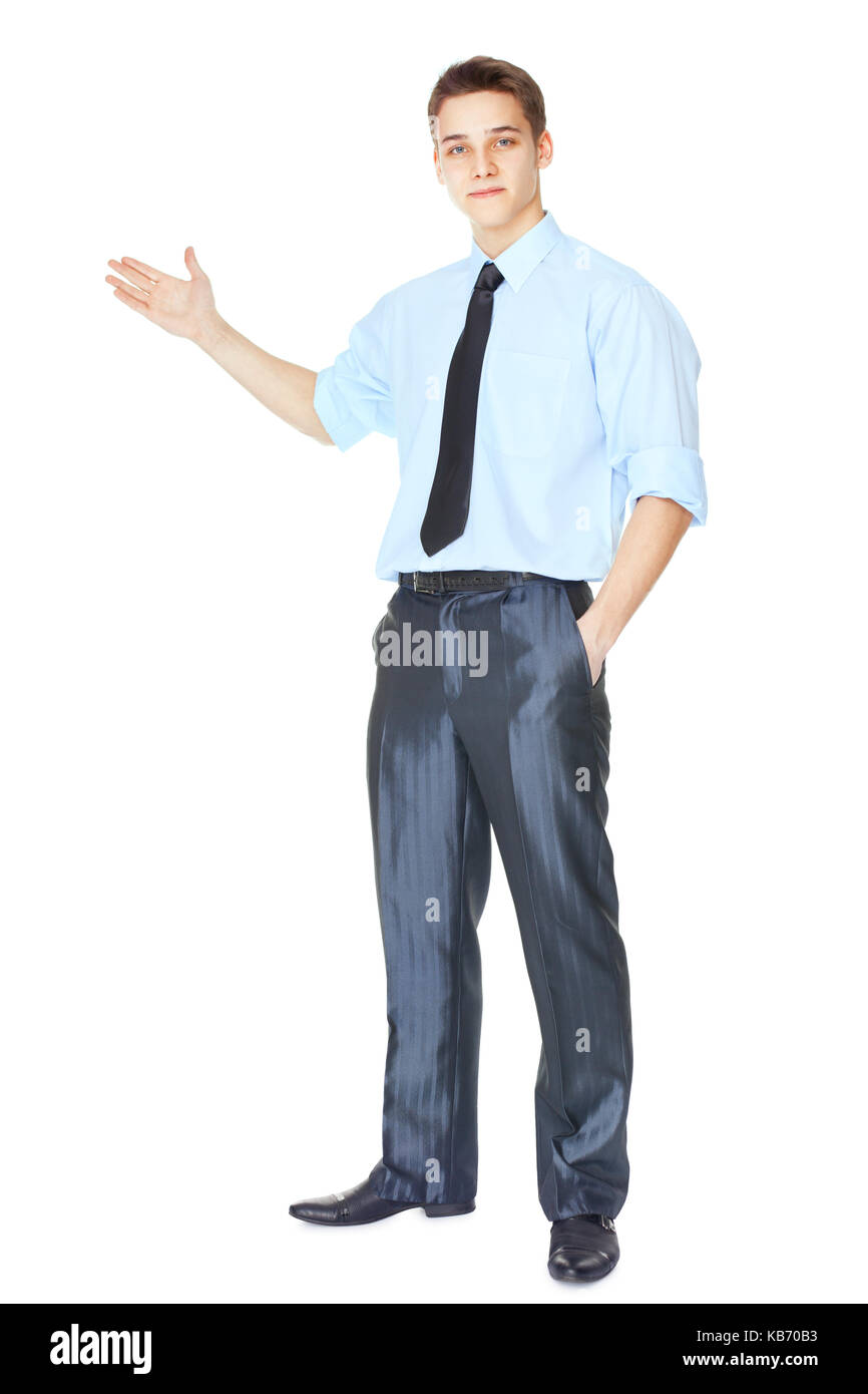 Full length portrait of young successful businessman showing a copy ...