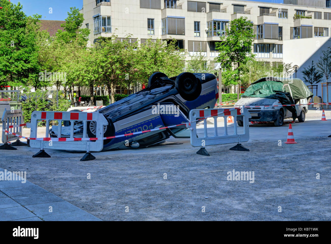 A police car is turned upside down in an car accident or art exhibition ...