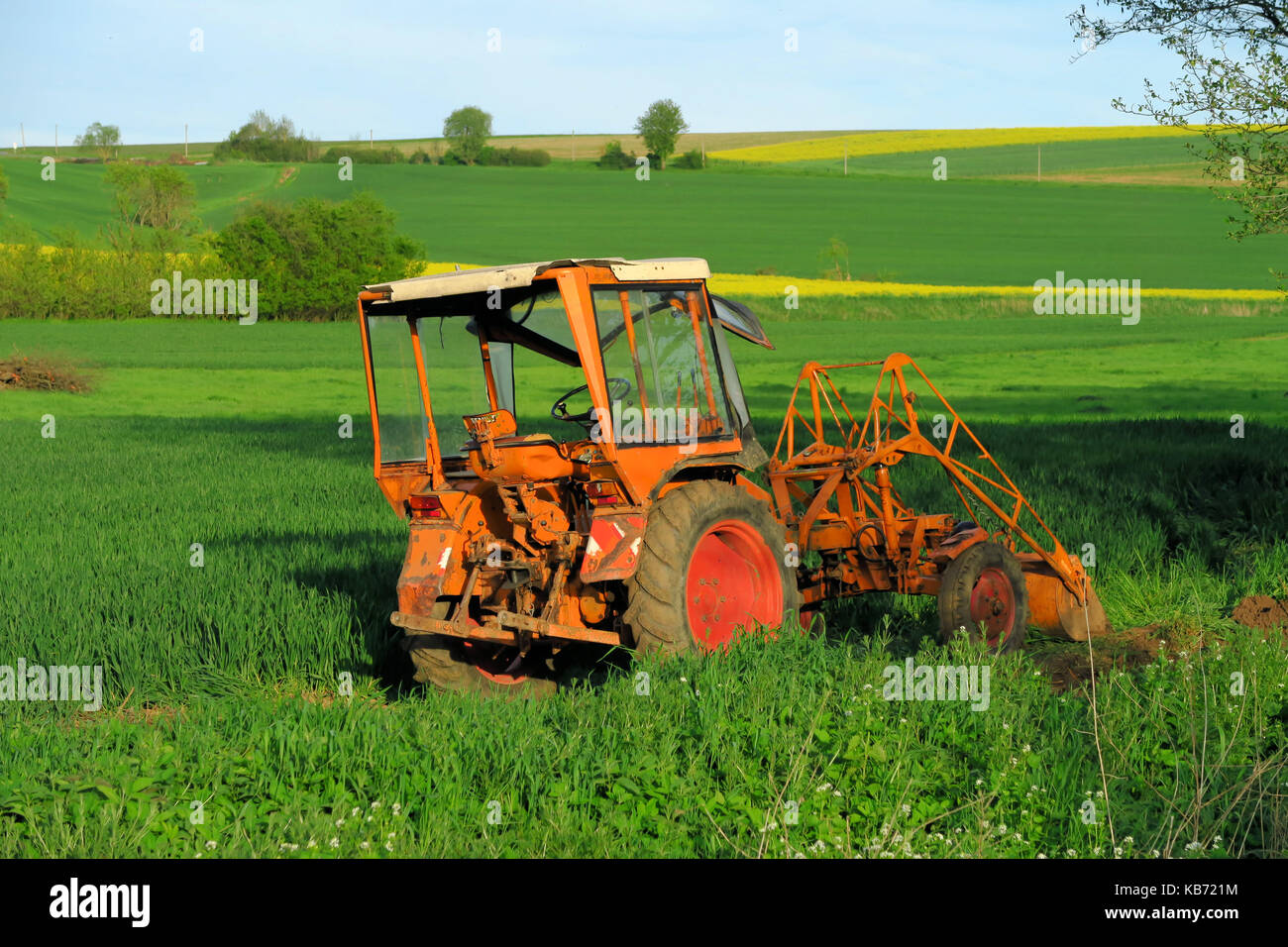 red farming equipment in German Bavarian countryside Stock Photo - Alamy
