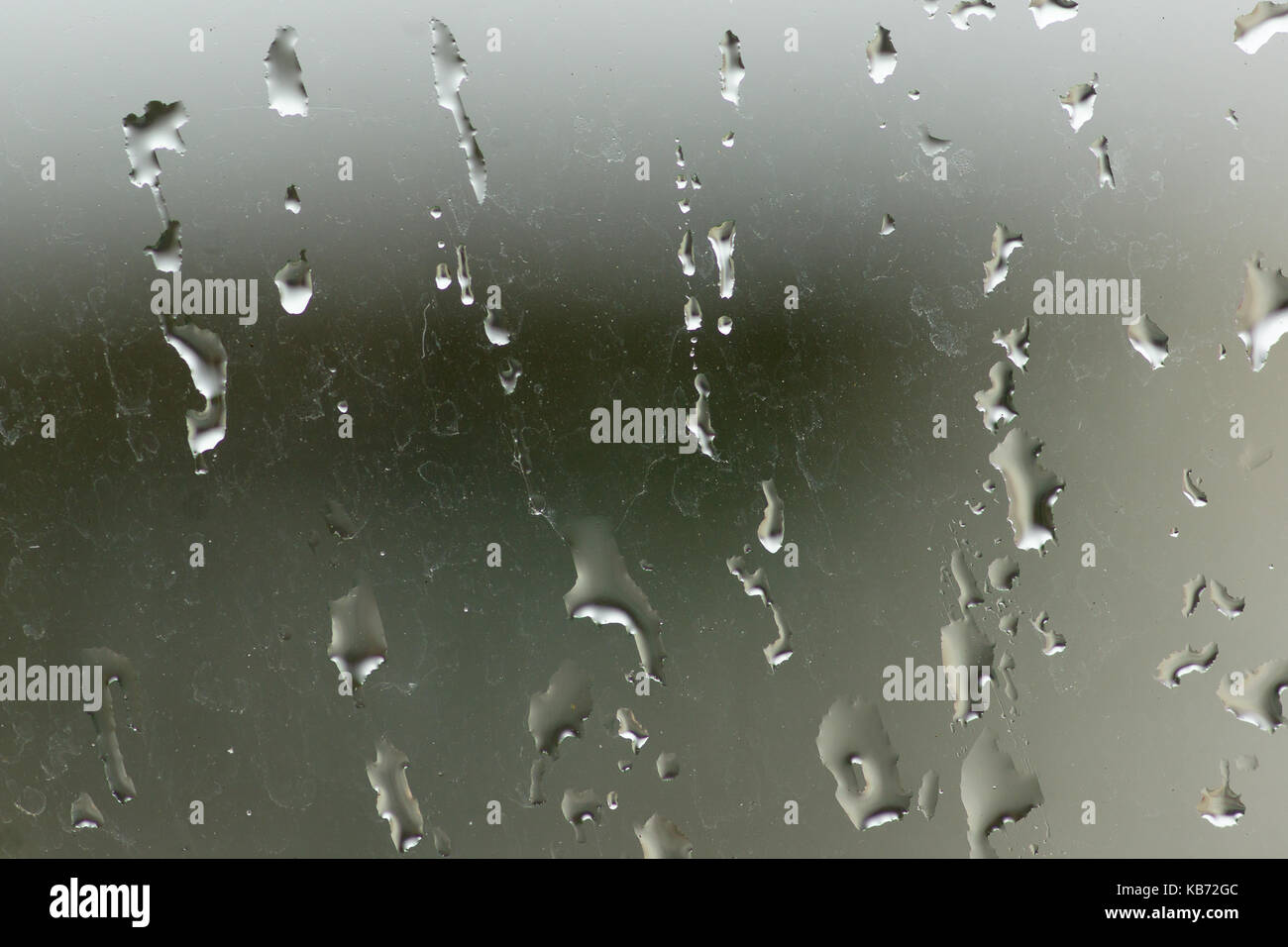 Water droplets and water streams on glass Stock Photo - Alamy