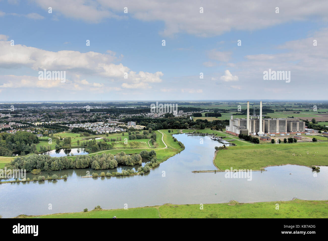 The banks of the river IJssel near the city of Zwolle with the dike and ...