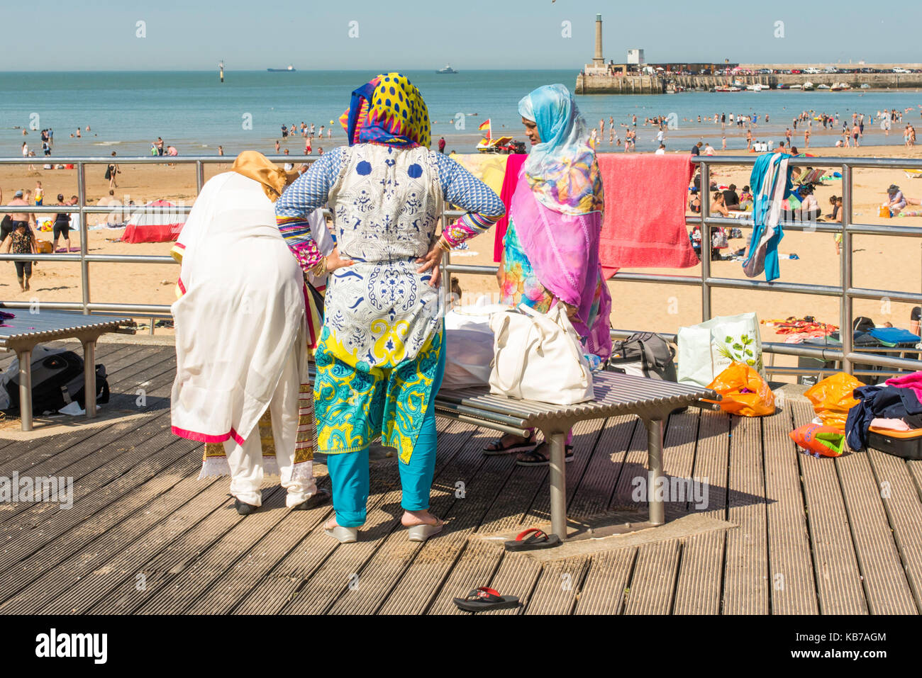 Asian women wearing headscarves on the seafront at Margate, Isle of ...