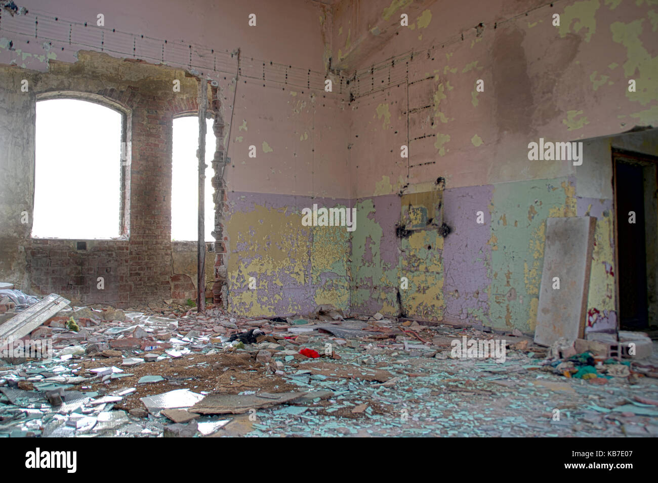 Destroyed warehouse – part of ruined factory hall. Forgotten industrial ...