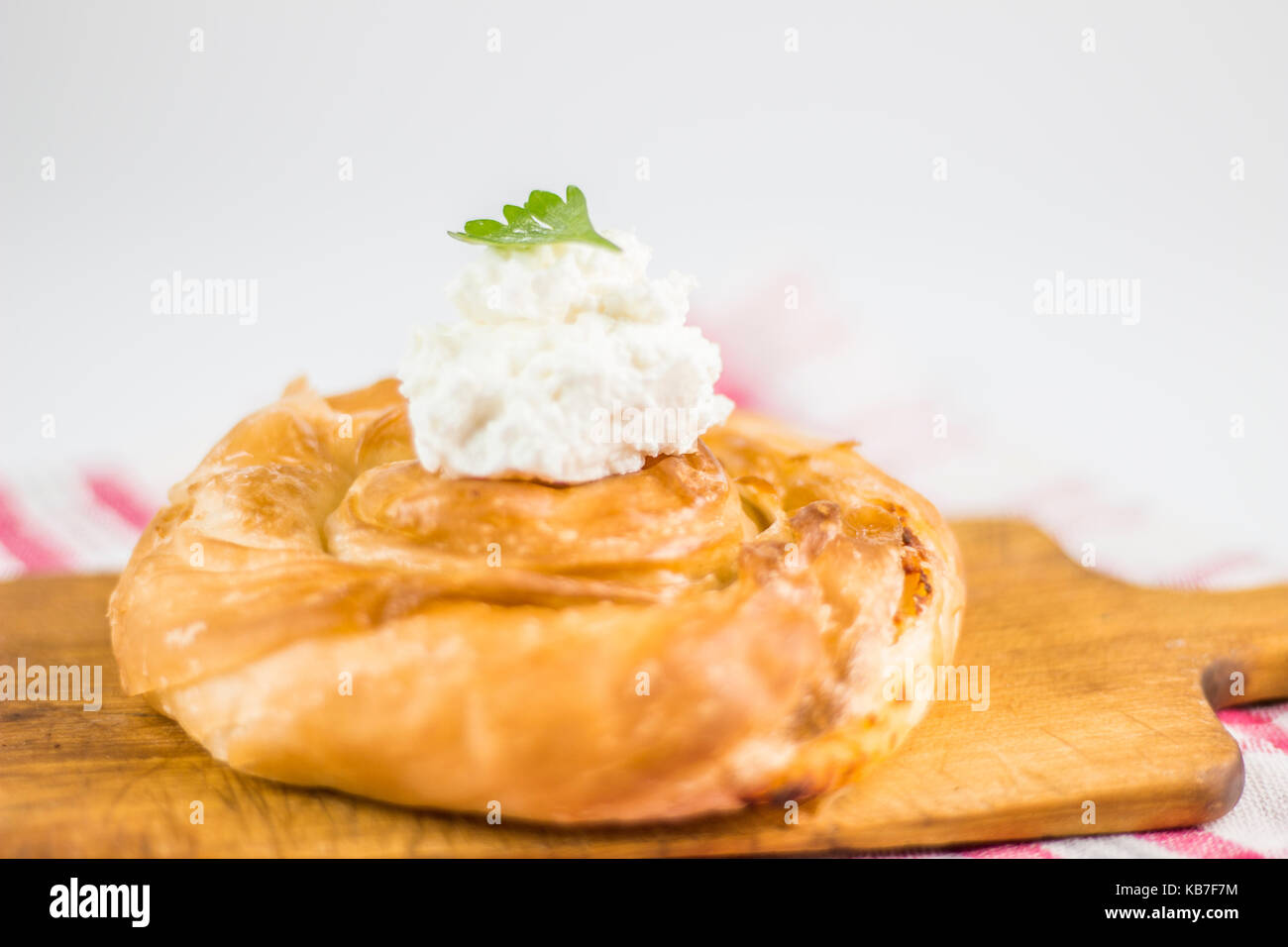 Cheese burek/sirnica composition on white background Stock Photo - Alamy