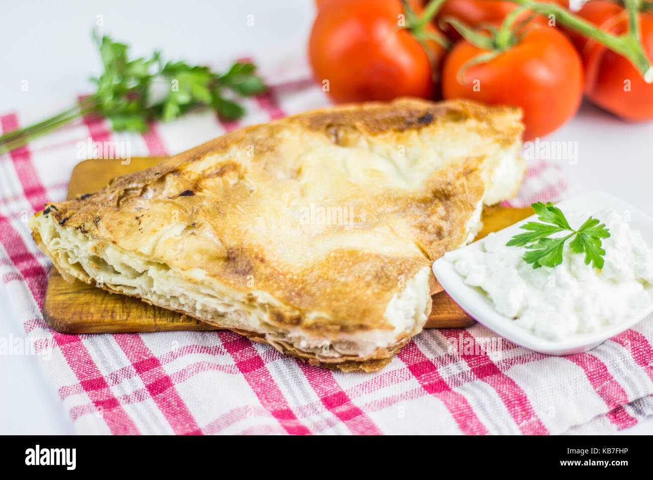 Cheese burek/sirnica composition on white background Stock Photo - Alamy
