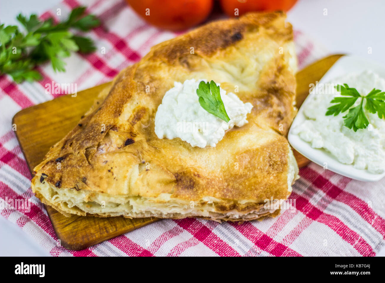 Cheese burek/sirnica composition on white background Stock Photo - Alamy