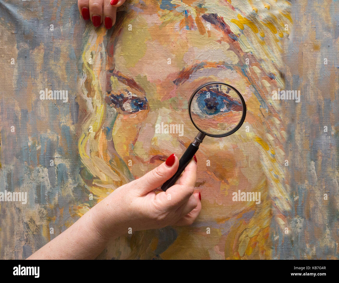 Artist hand with magnifying glass checking proportions on the young ...