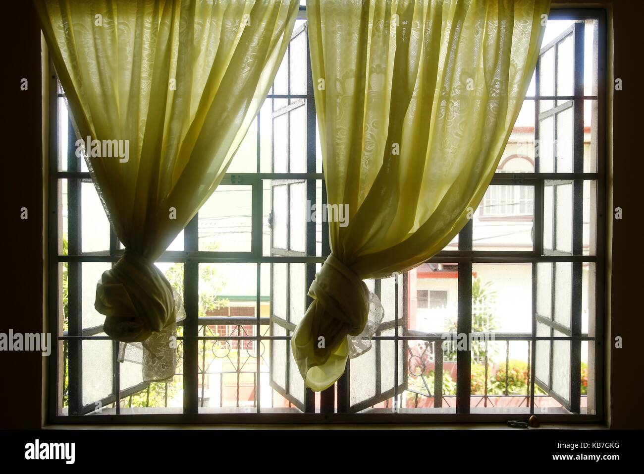 Photo of a window with curtains Stock Photo - Alamy
