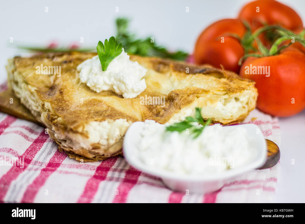 Cheese burek/sirnica composition on white background Stock Photo - Alamy