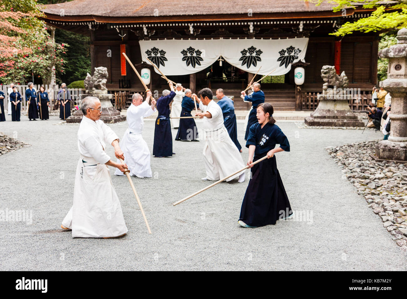 Japan, Osaka, Tada. Master samurai swordsman dressed in white fighting ...