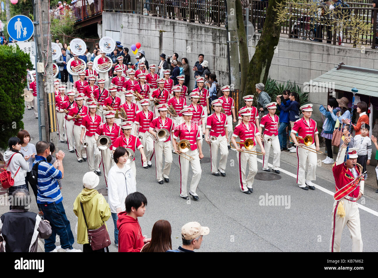 Japan, Tada, yearly Genji parade. Women's Wind Band in pink tunics and ...