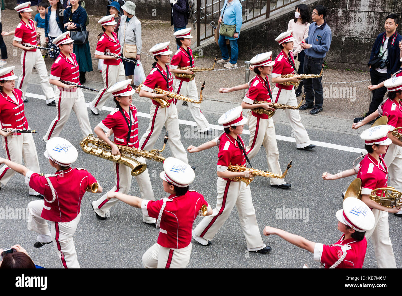 Japan, Tada, yearly Genji parade. Women's Wind Band in pink tunics and ...