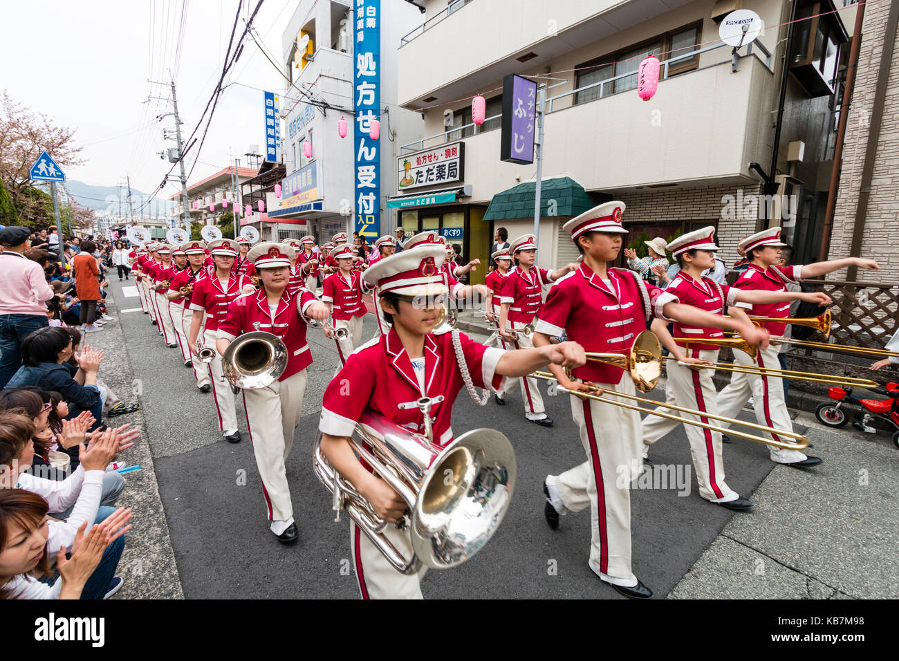 Japan, Tada, yearly Genji parade. Women's Wind Band in pink tunics and ...