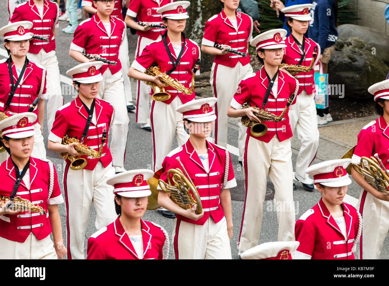 Japan, Tada, yearly Genji parade. Women's Wind Band in pink tunics and ...