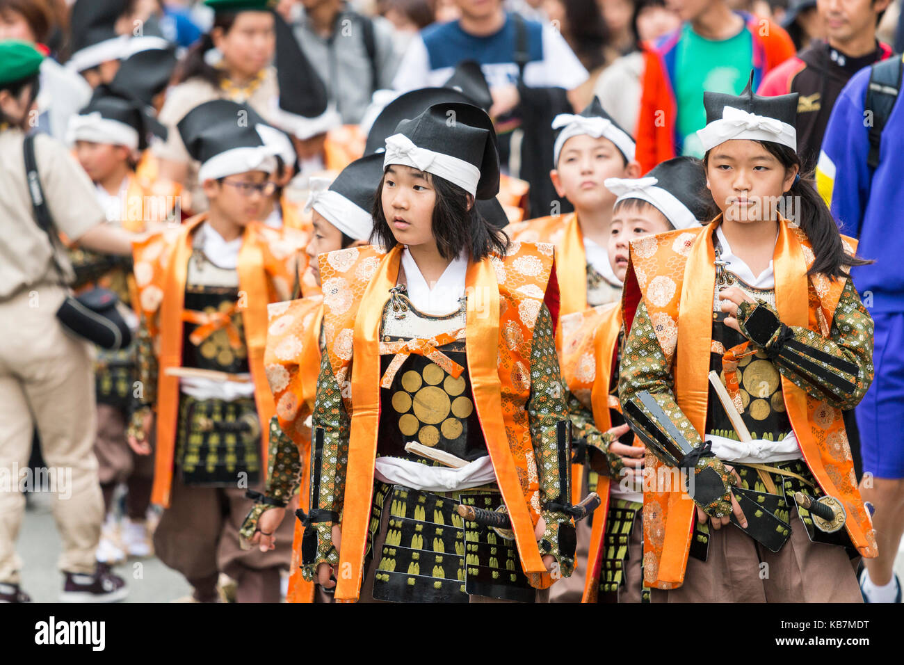 Japan, Osaka, Tada. Yearly Genji parade. Children dressed in armour ...