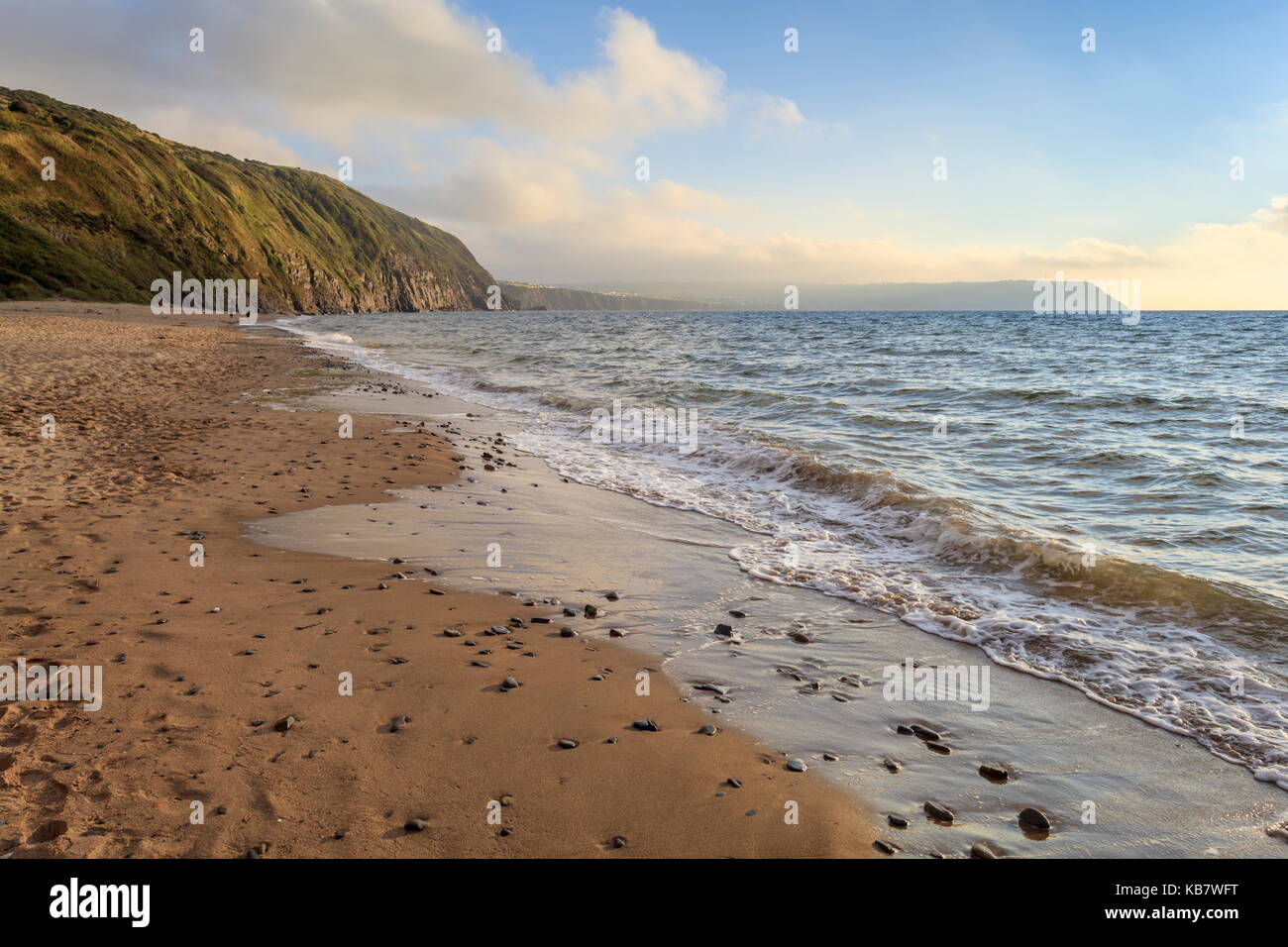 Looking towards Aberporth on a virtually deserted Penbryn beach on a ...