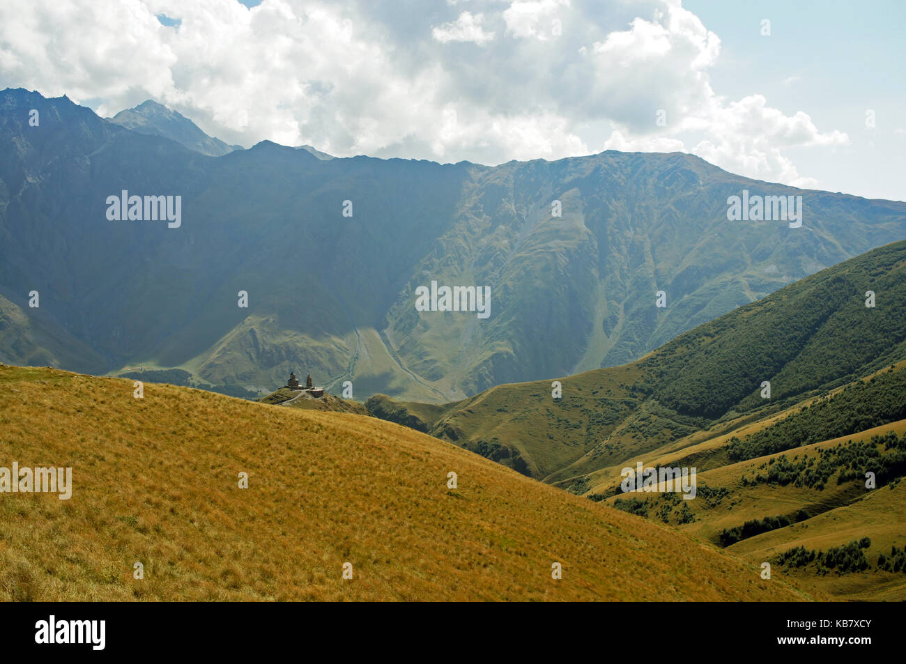Chapel and the church in Stepantsminda (Kazbegi) in Georgia Stock Photo ...