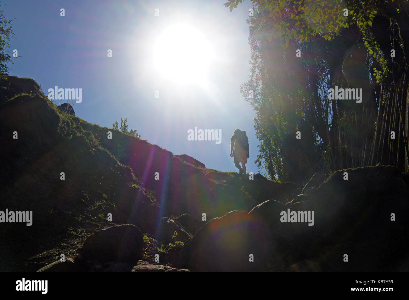 Hiker in the sunlight Stock Photo - Alamy