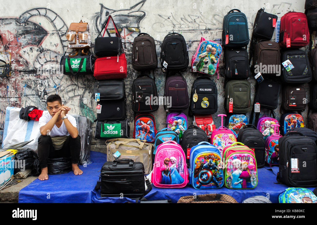 Street vendor sells various backpacks at Palembang City, South Sumatera ...