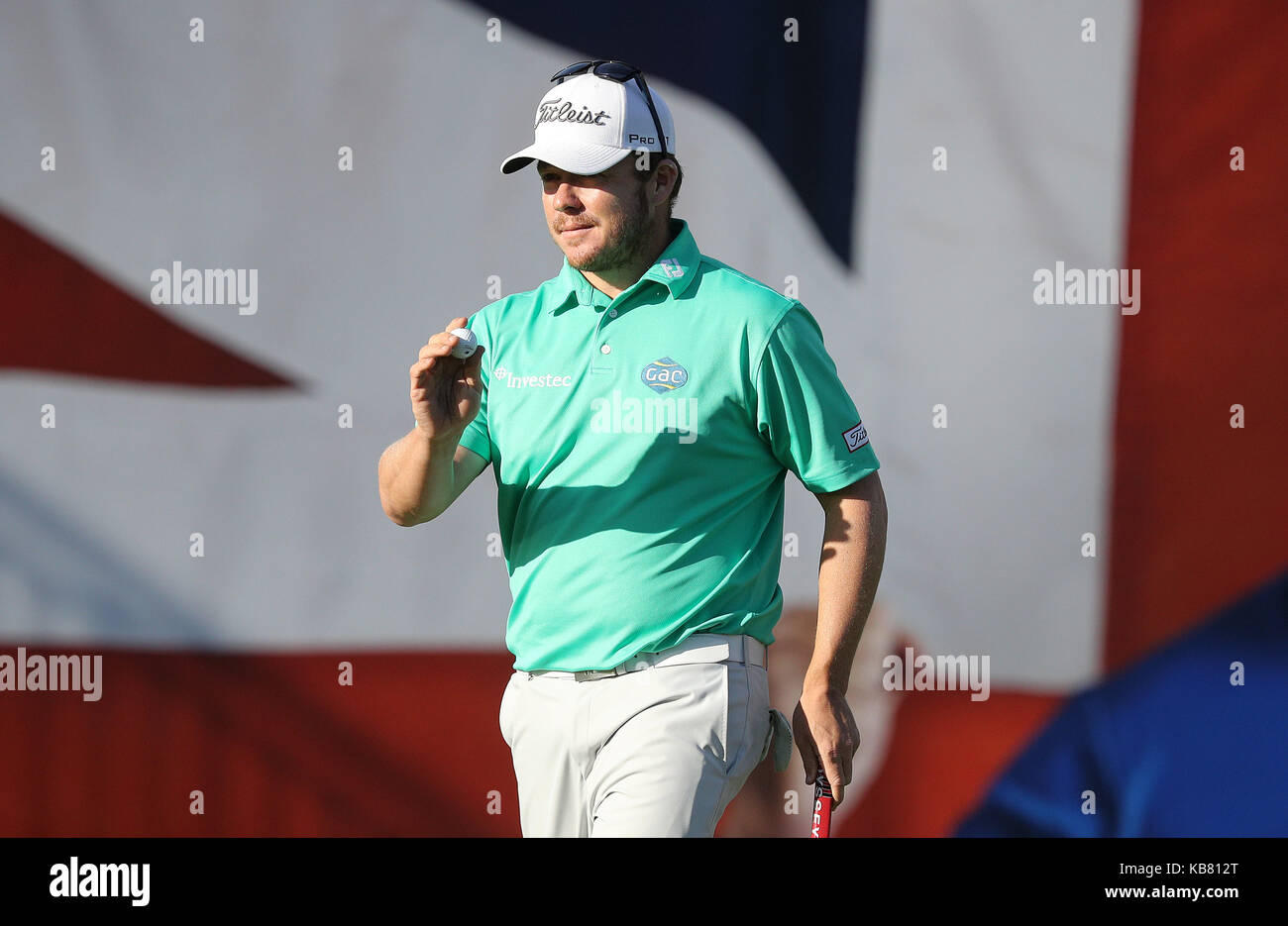 South Africa's George Coetzee celebrates his putt on the 18th during ...