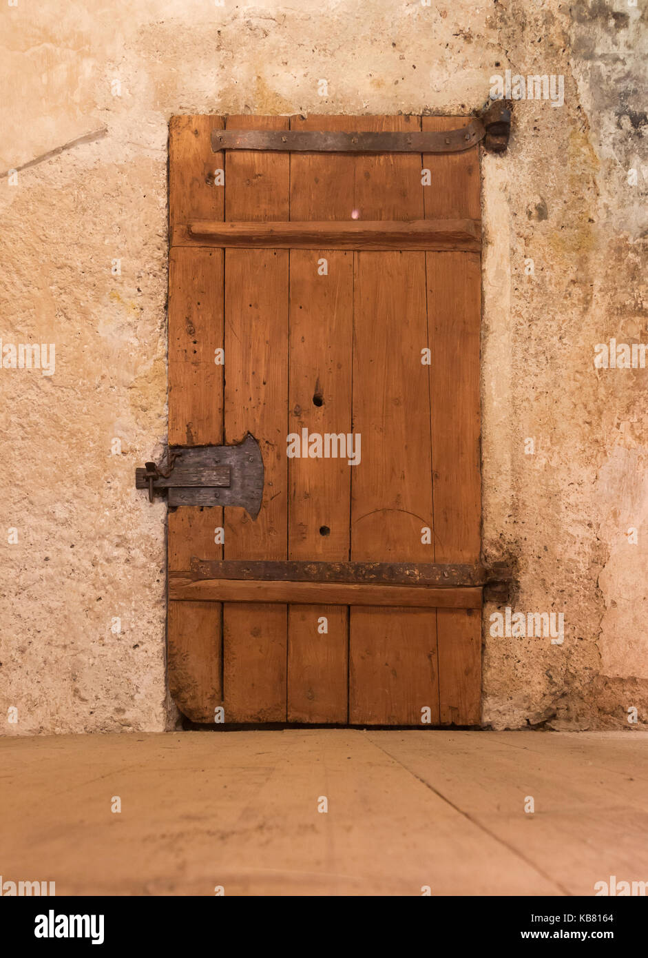 Very old door with a metal lock Stock Photo - Alamy