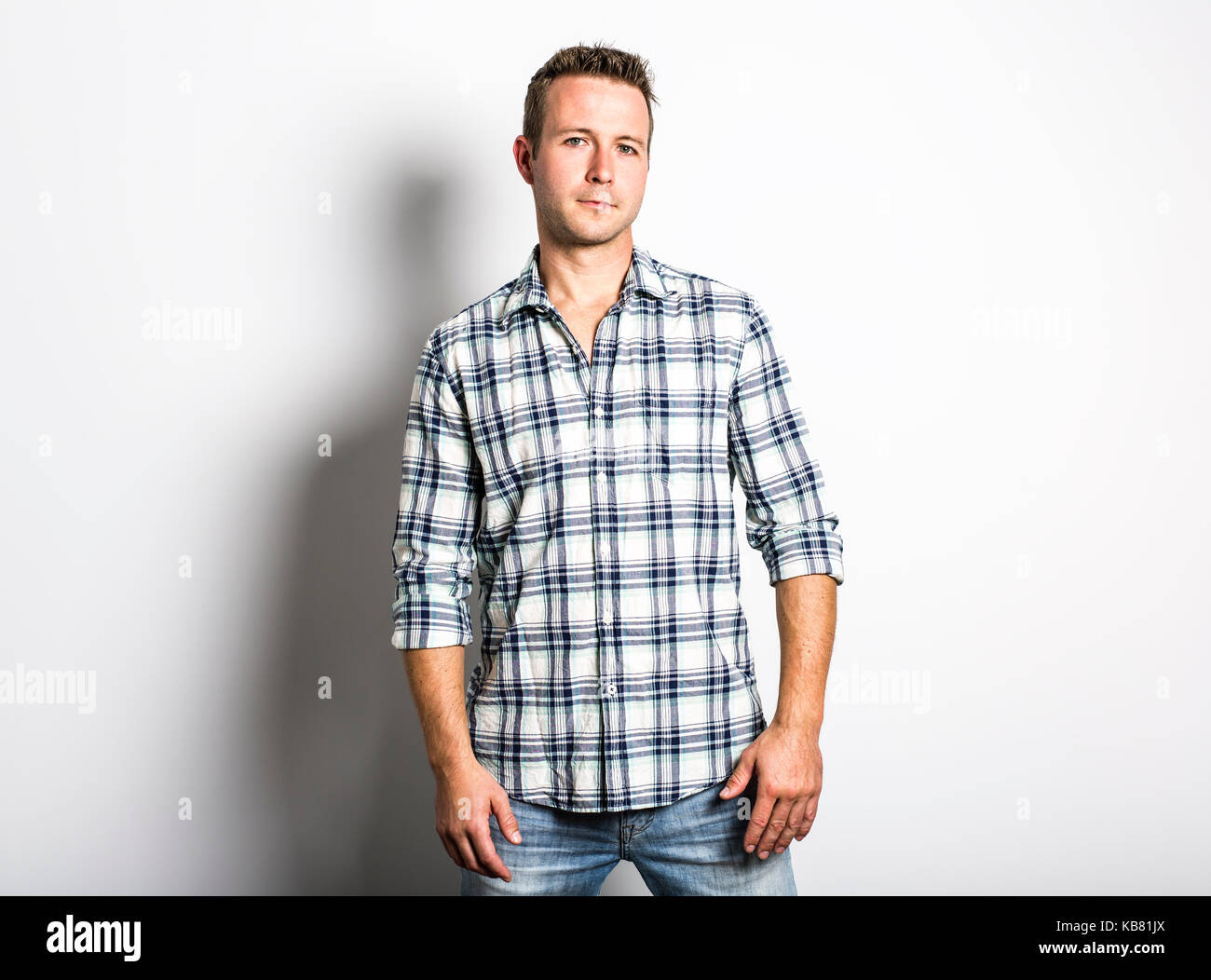 handsome dude in grey, portrait Stock Photo - Alamy