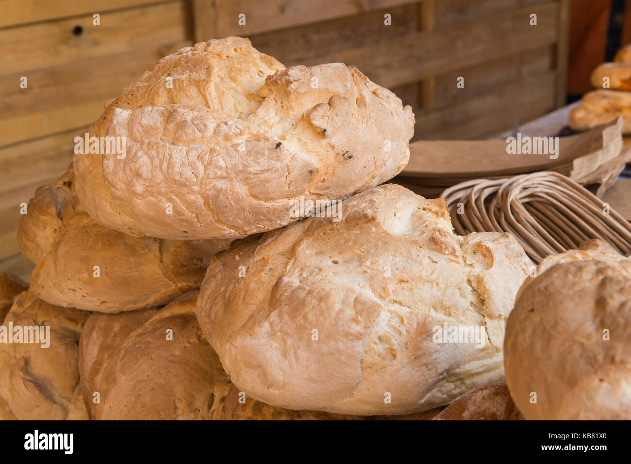 Rustic bread loaves on a market stall, Badajoz Stock Photo - Alamy