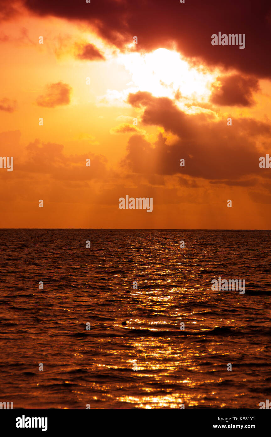 Sunset on the coast of the Caribbean Sea. Dominican sunset Stock Photo ...