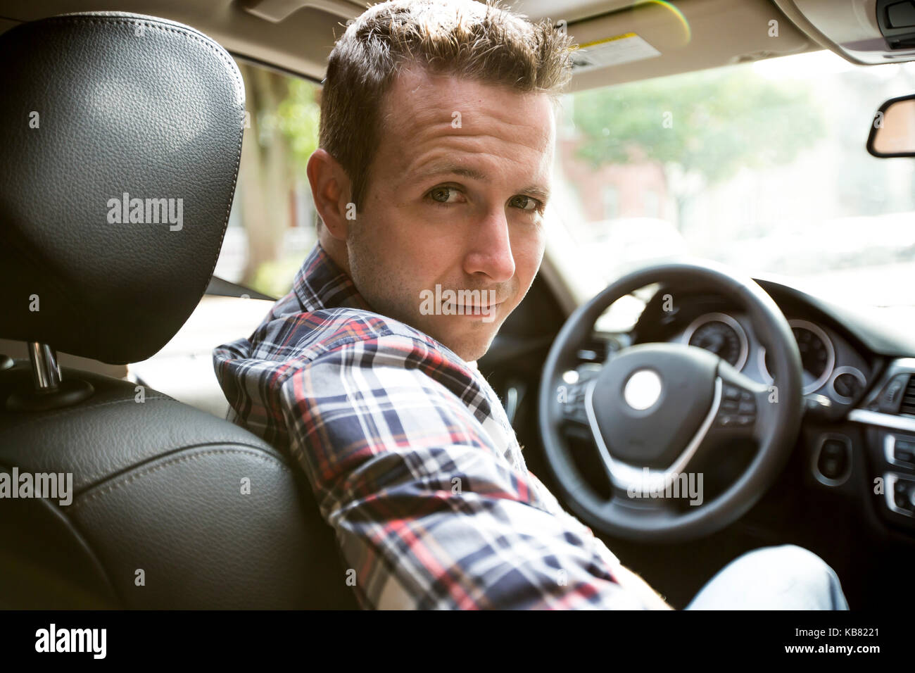 nice men with his brand new car Stock Photo - Alamy