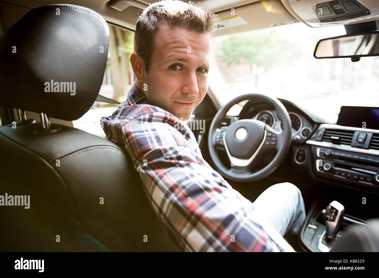 nice men with his brand new car Stock Photo - Alamy
