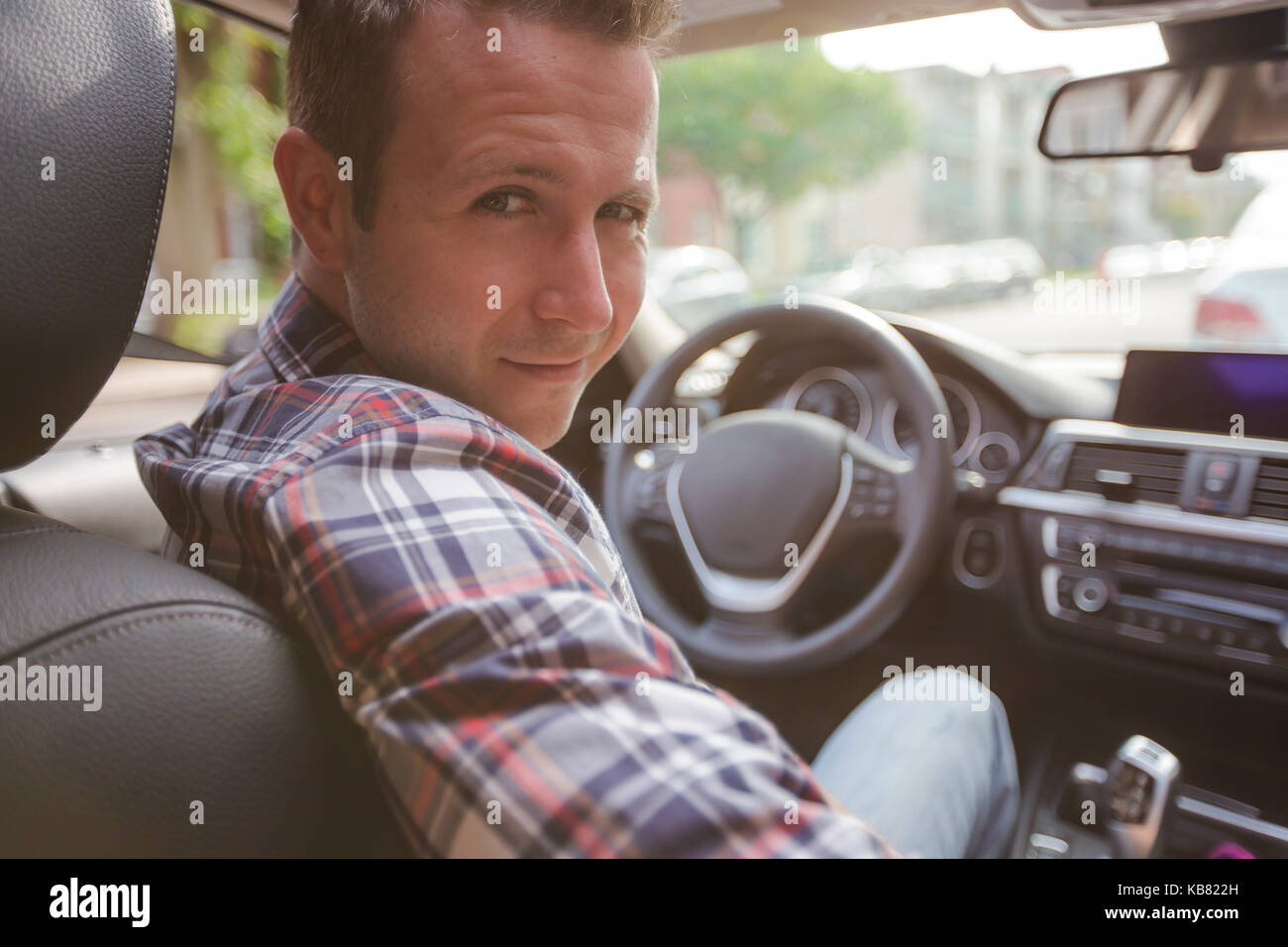 nice men with his brand new car Stock Photo - Alamy