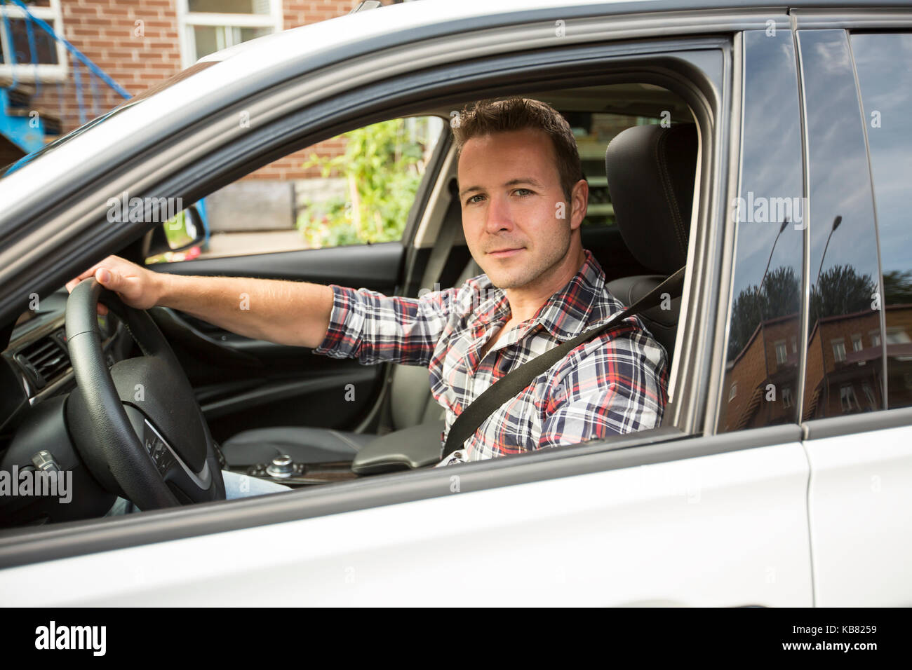 nice men with his brand new car Stock Photo - Alamy