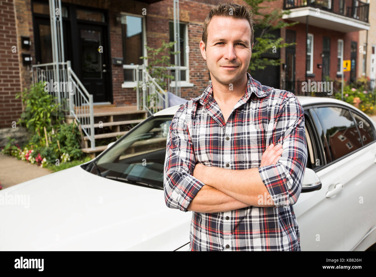 nice men with his brand new car Stock Photo - Alamy