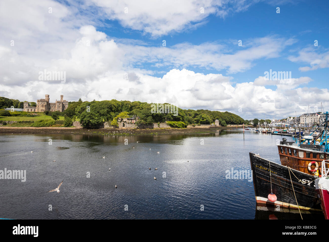 Port of Stornoway with boats and Lews Castle, Outer Hebrides, Scotland ...