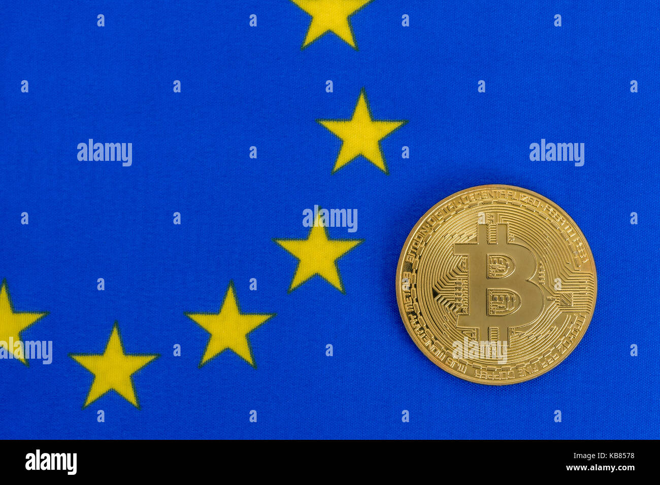 Blue EU flag with gold bitcoin - as metaphor for the European Digital ...
