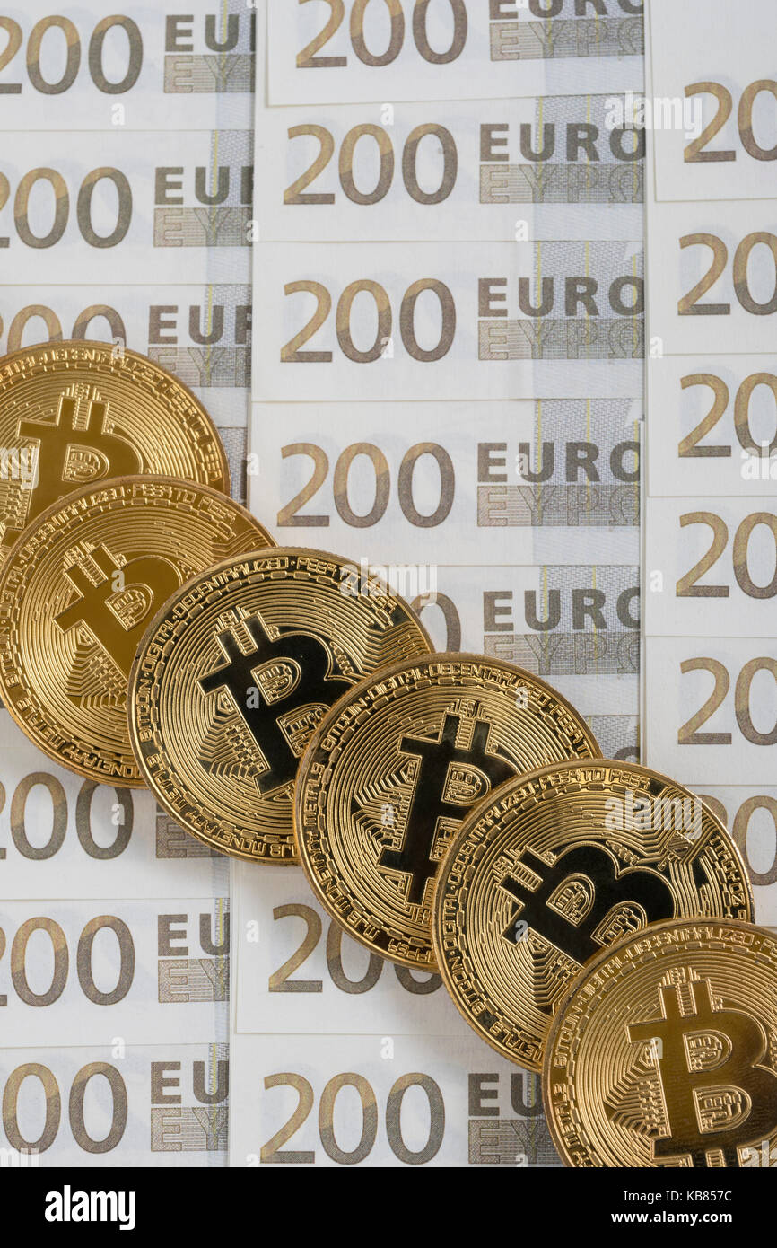 Gold Bitcoin on 200 Euro banknote. For European Digital Single Market ...