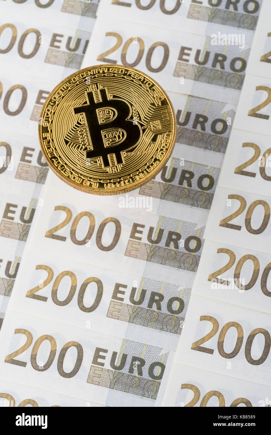 Gold Bitcoin on 200 Euro banknote. For European Digital Single Market ...